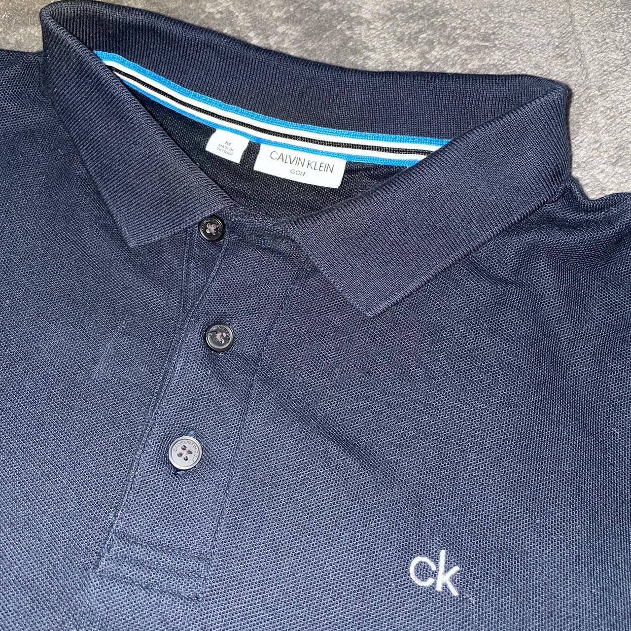 Calvin Klein Polo Shirt in Navy Men’s size... - Depop