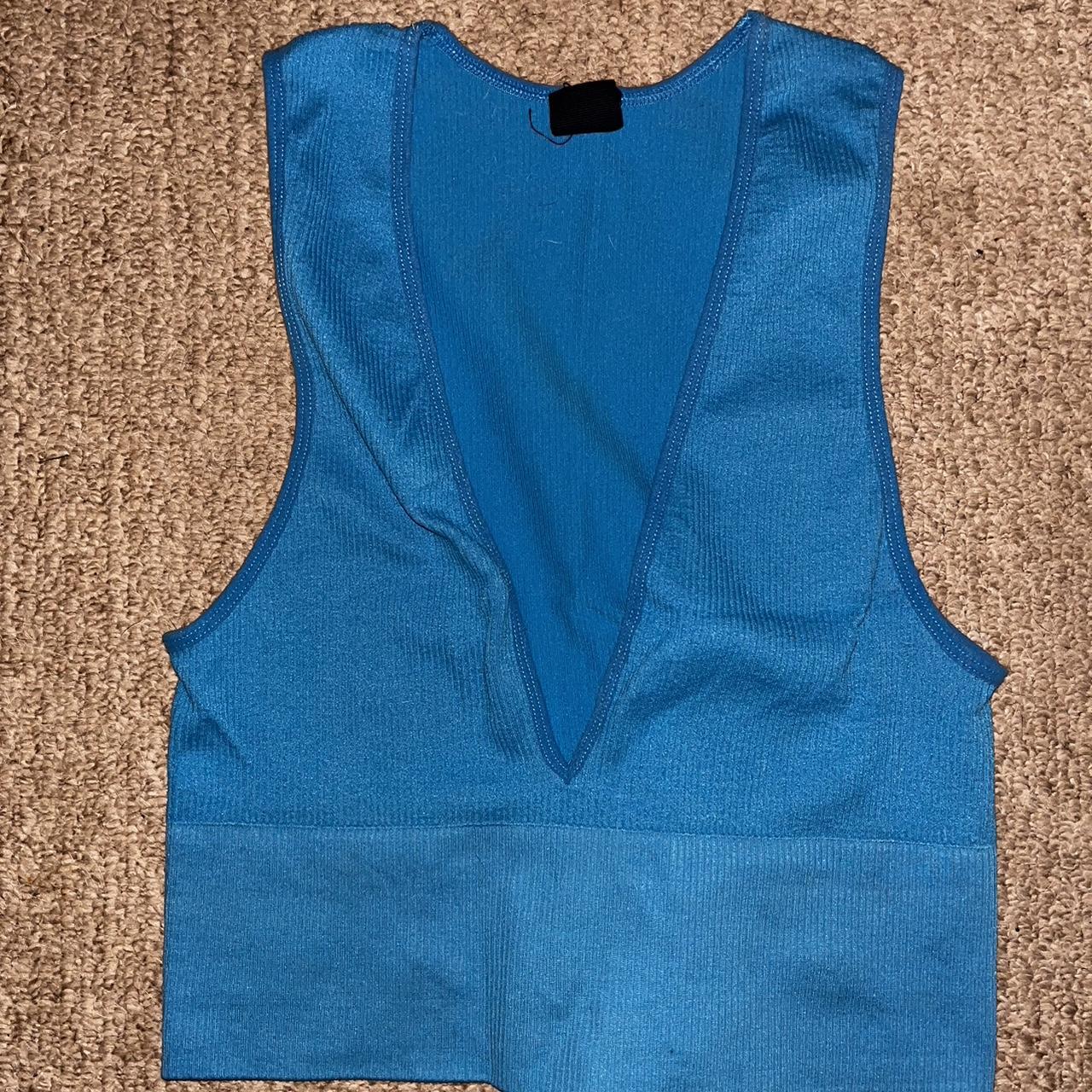 Fitted deep V blue vest from UO Will fit multiple... - Depop
