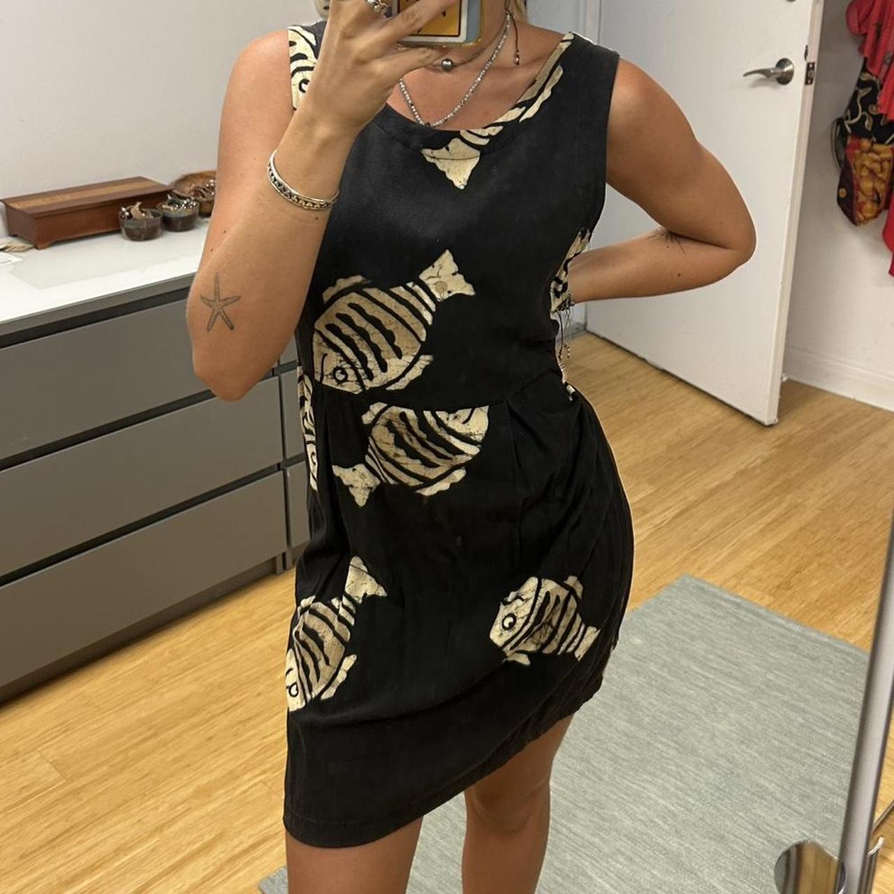 Black and tan fish print dress with a flowy, A-line... | Depop