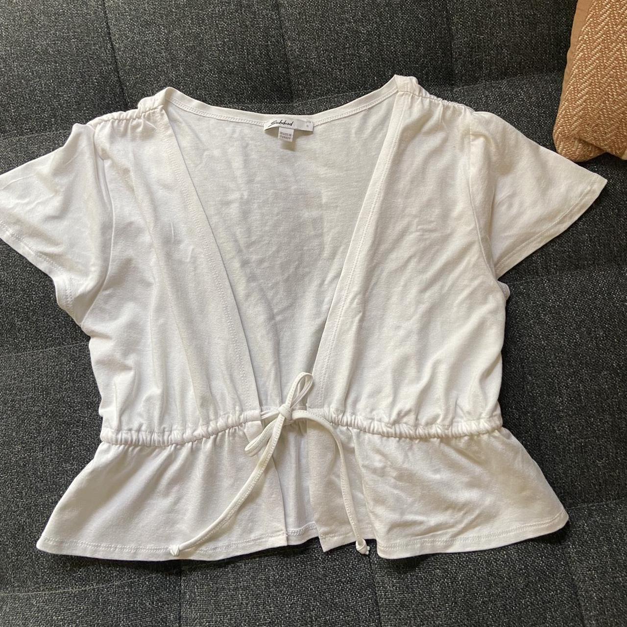 Subdued white front tie adjustable babydoll ruffle top - Depop