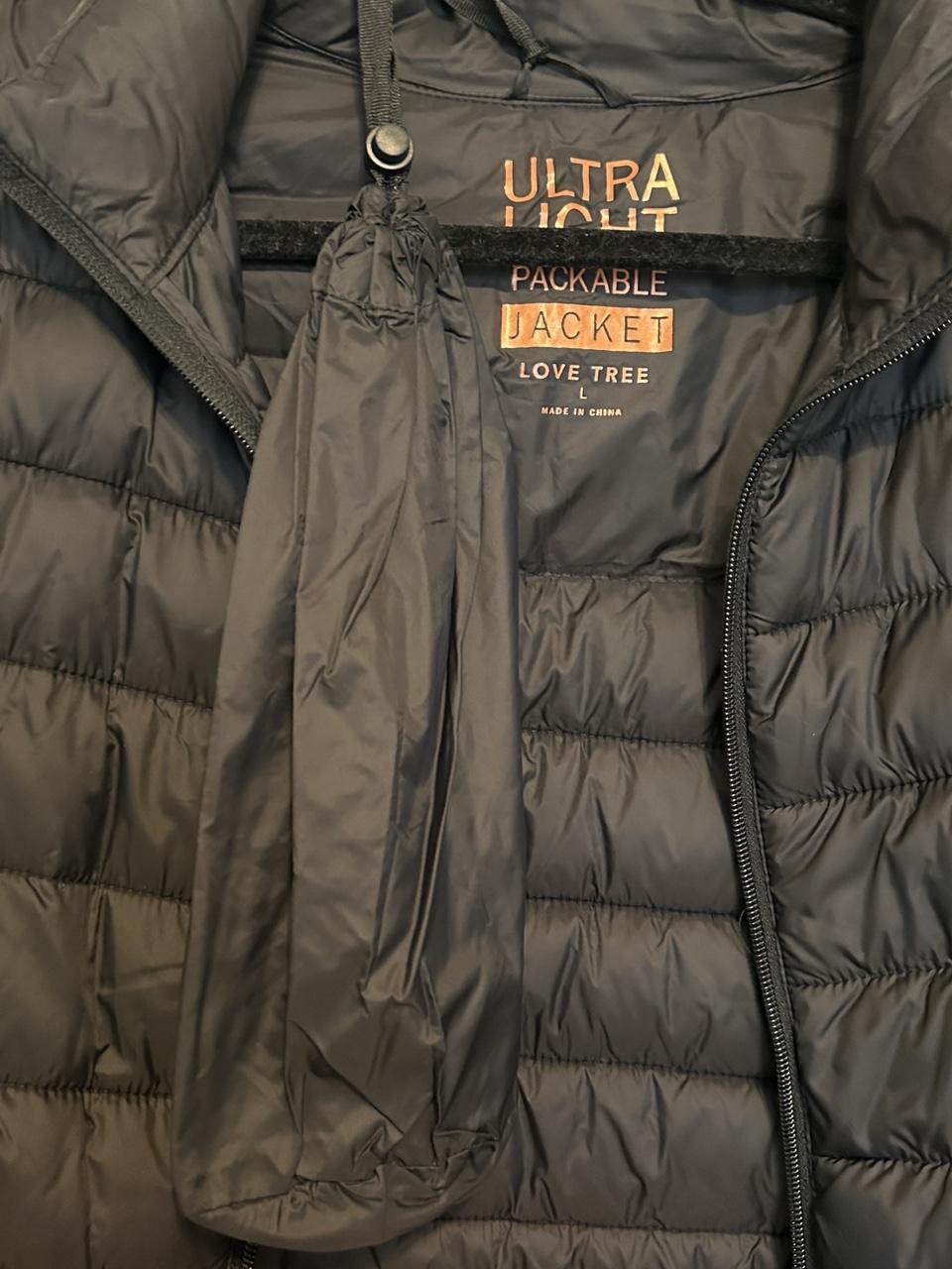 Packable fitted black puffer jacket. Size L, brand... - Depop