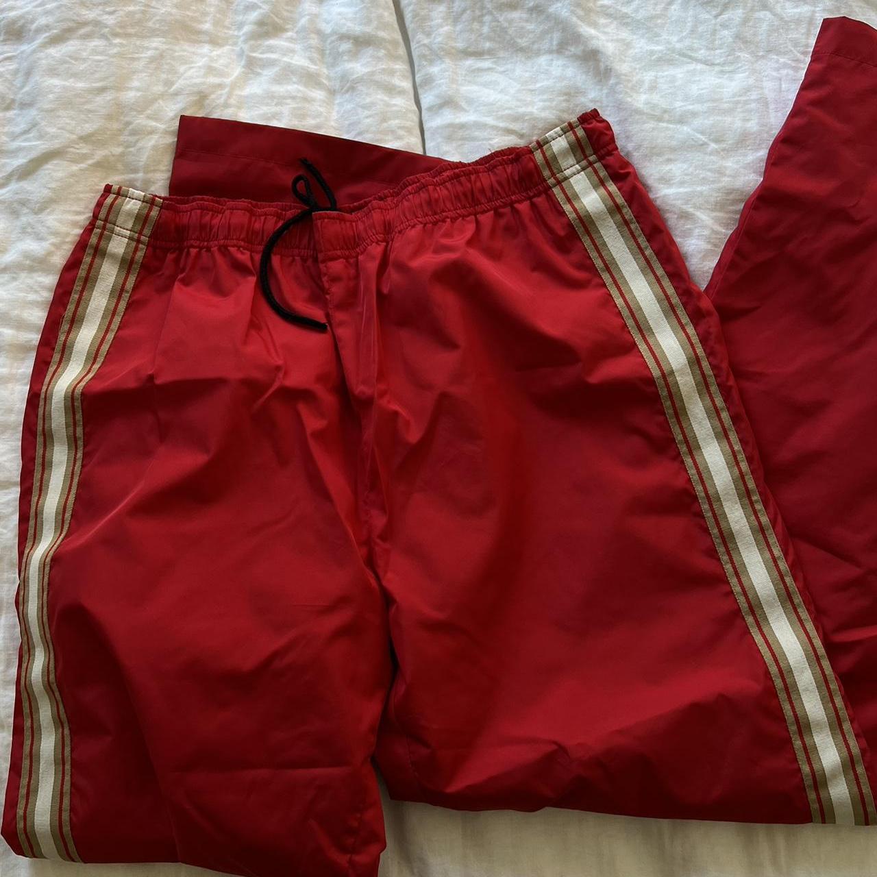 Red pants with stripe detail Size M Adjustable... - Depop