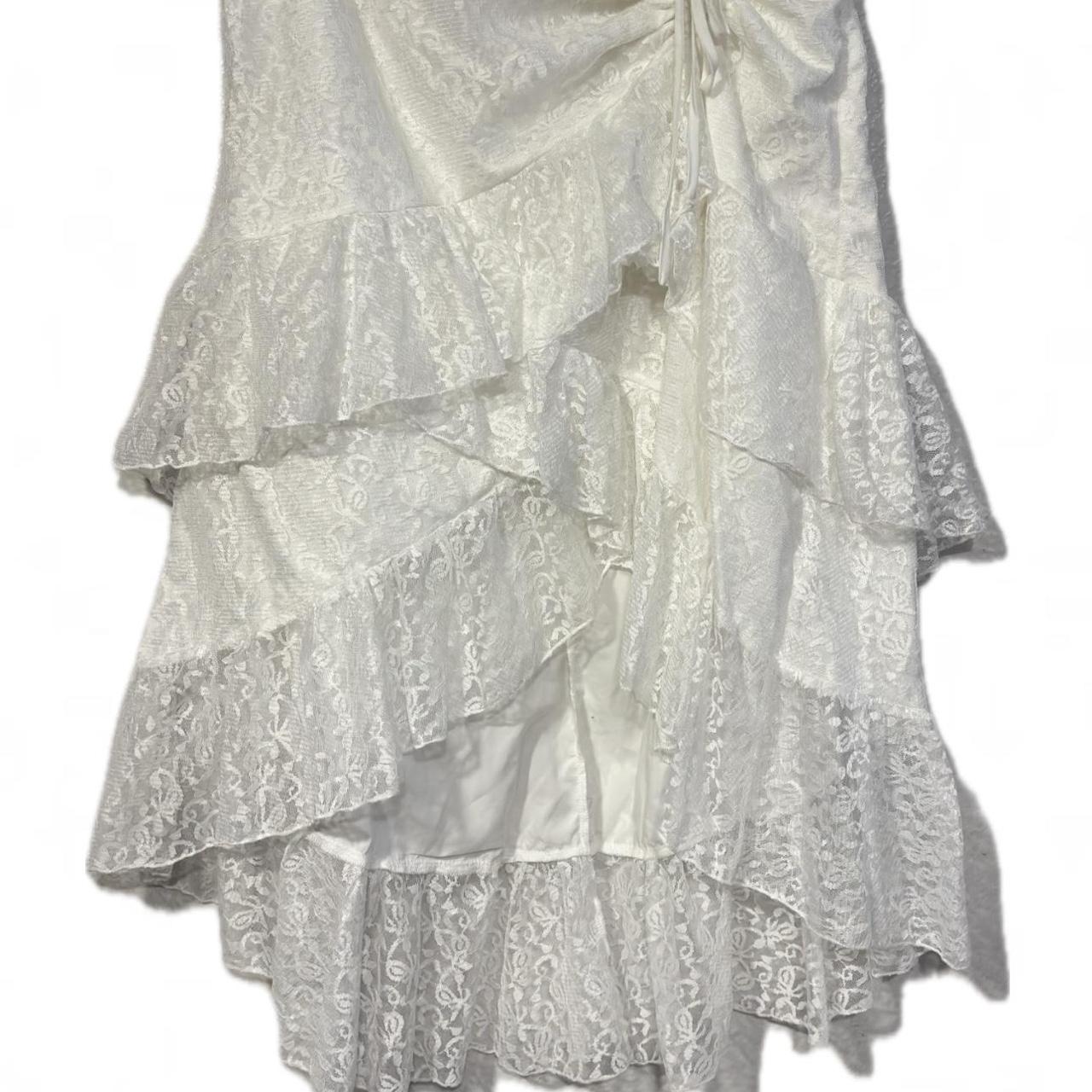 White lace ruffle skirt with tie waist. Never worn... | Depop