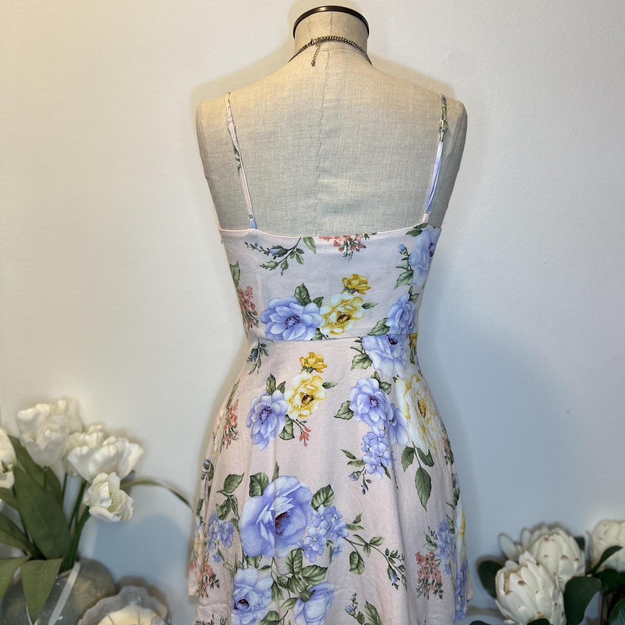 Light pink floral mini dress with tie front and... | Depop