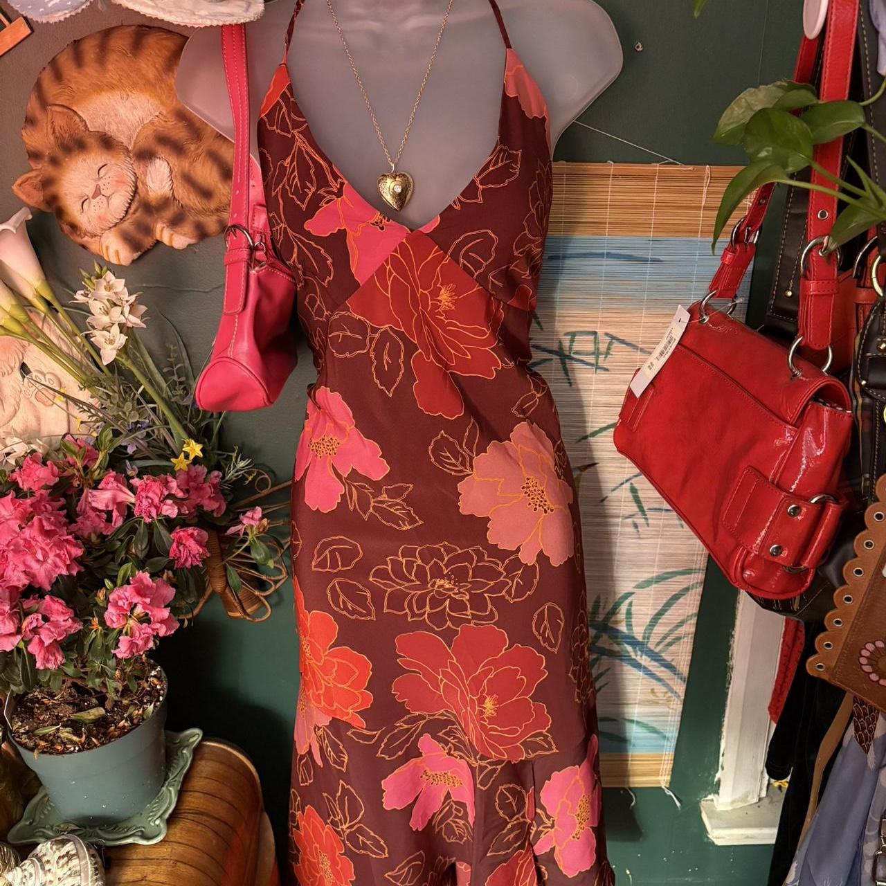 Brown and pink floral mini dress with halter neck... | Depop