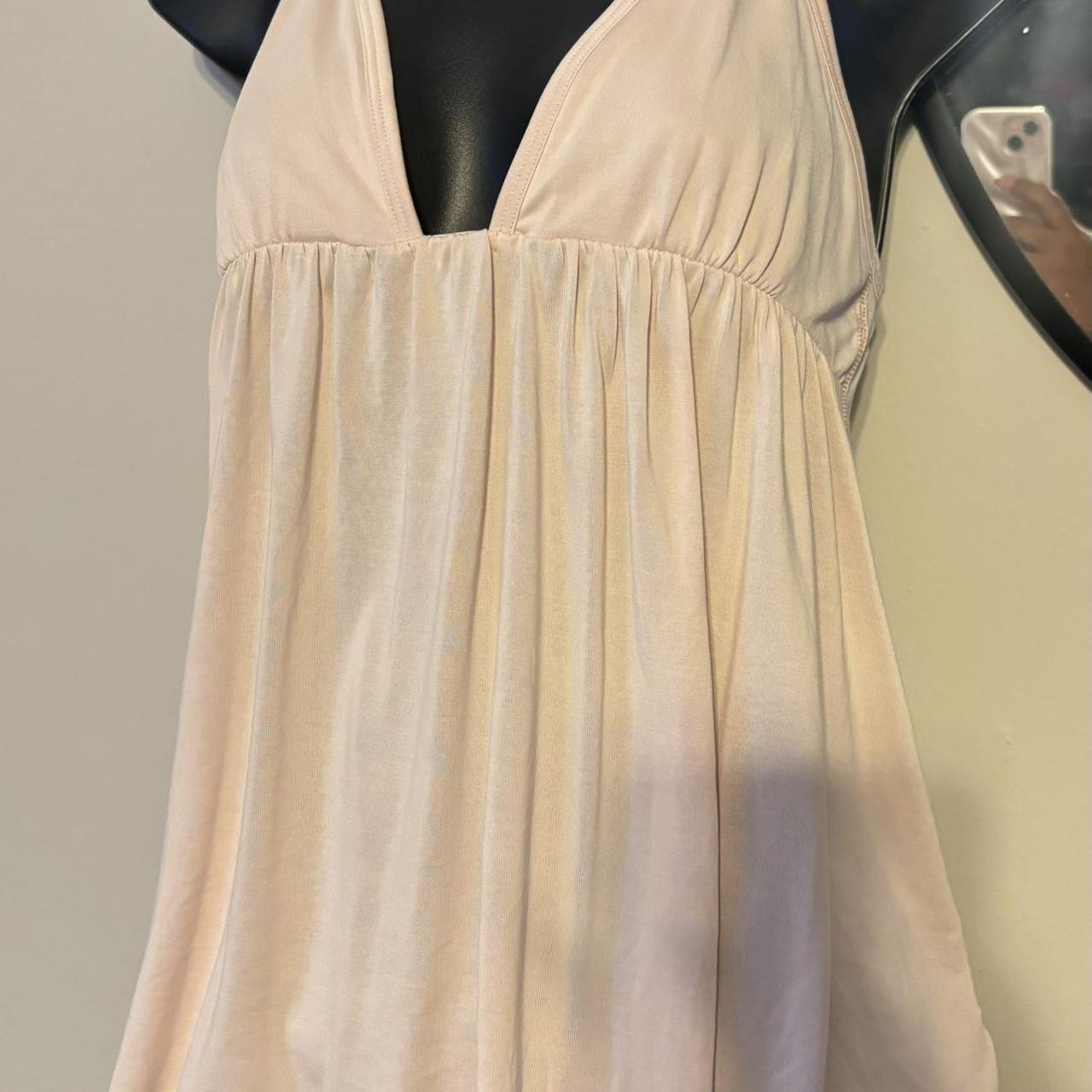 Free People Cream halter top with a relaxed fit... | Depop