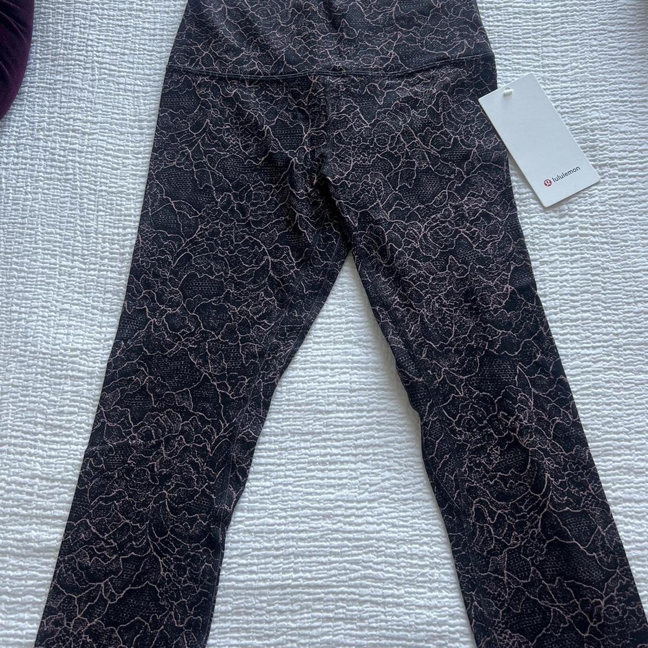 Black with pink floral pattern lulu lemon leggings.... - Depop