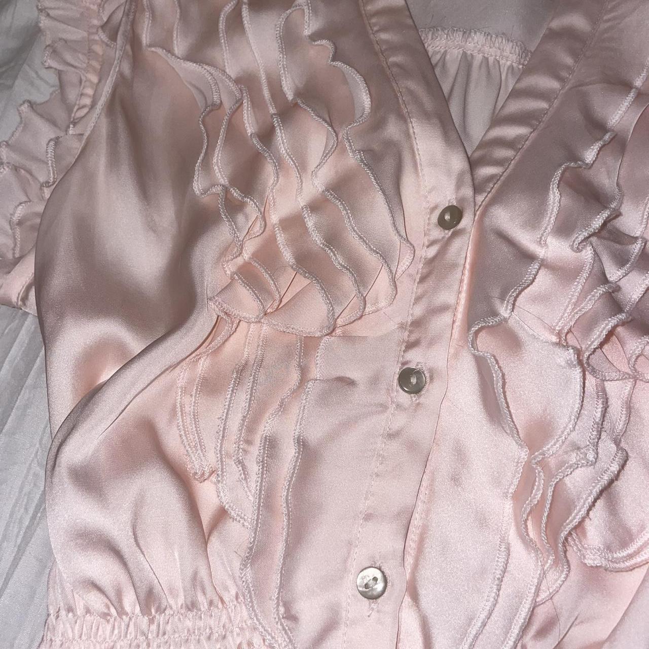 Pink ruffle blouse with button-up front Converse... | Depop
