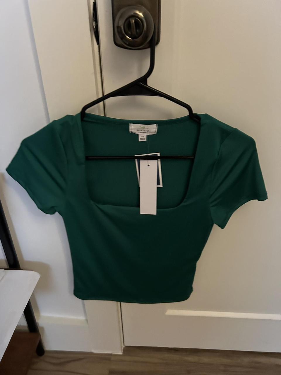Green going out top. NEW WITH TAGS. Xs, but fits... - Depop