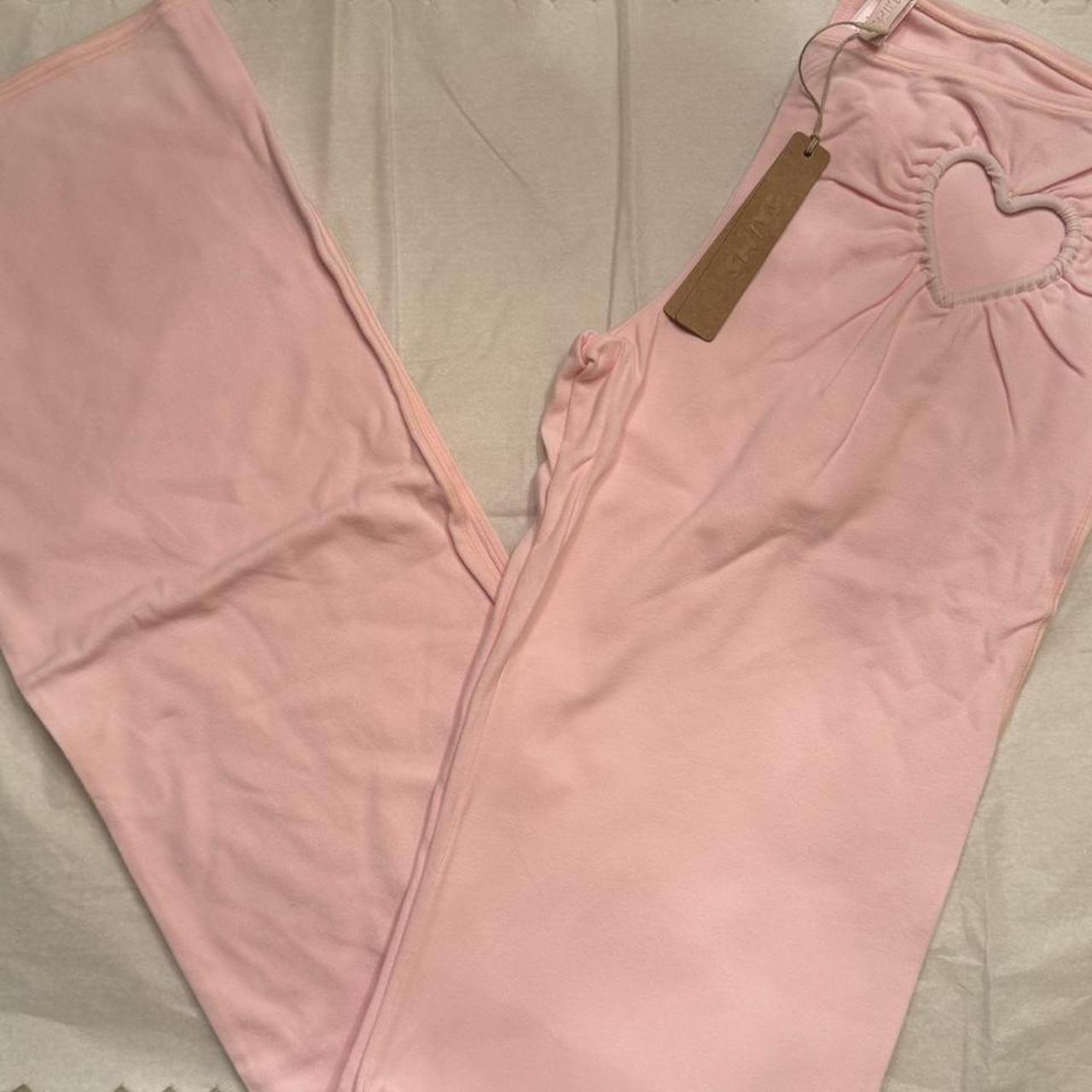 NWT SKIMS HEART CUT OUT FLARE LEGGINGS - CHERRY... | Depop