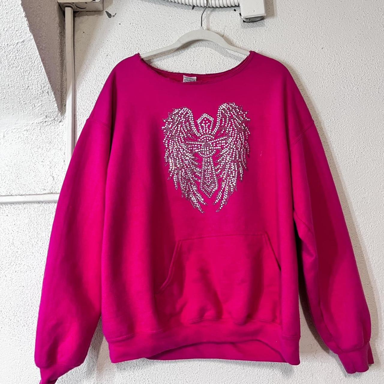 Y2K crewneck a cross with wings design and an off... - Depop