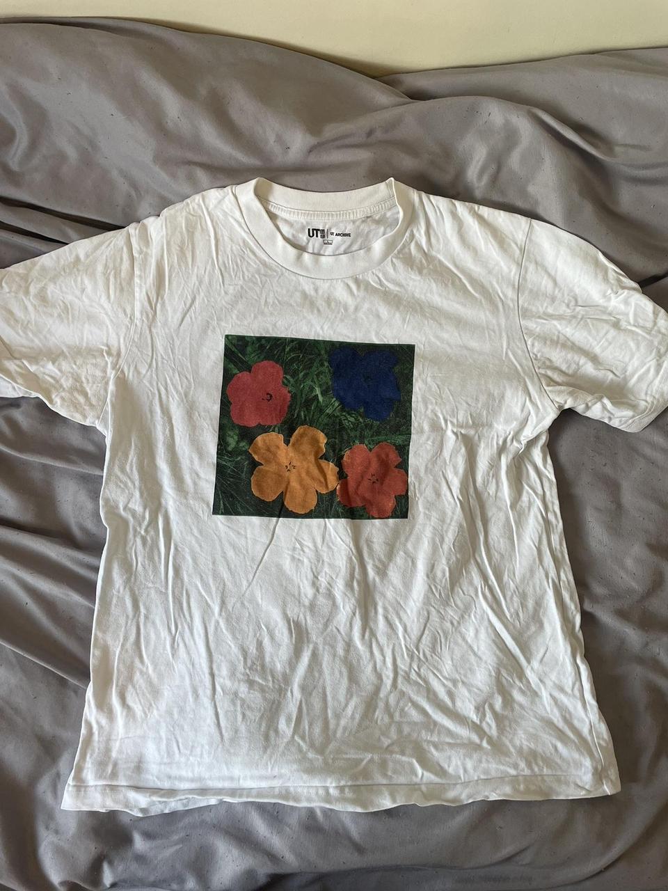 Uniqlo graphic tee in white. Great condition Size... - Depop