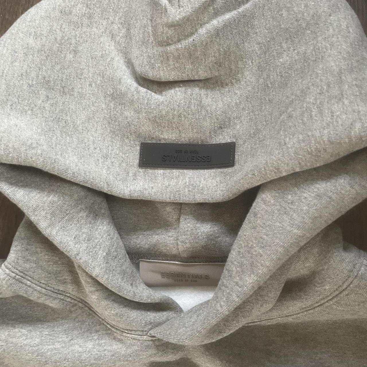 Essentials dark oatmeal hoodie Brand new in bag... | Depop