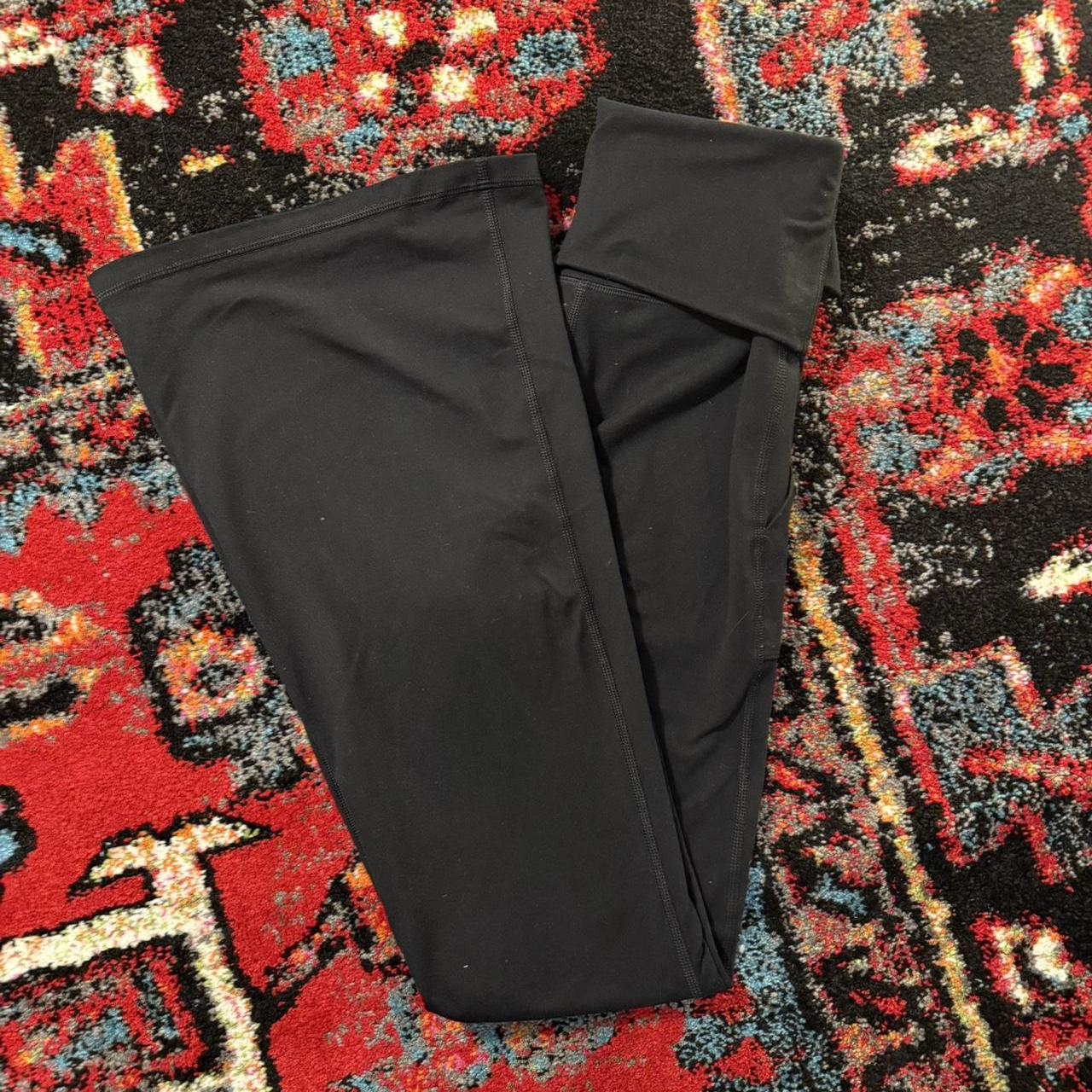 Black Aerie high-waisted fold-over flare... | Depop
