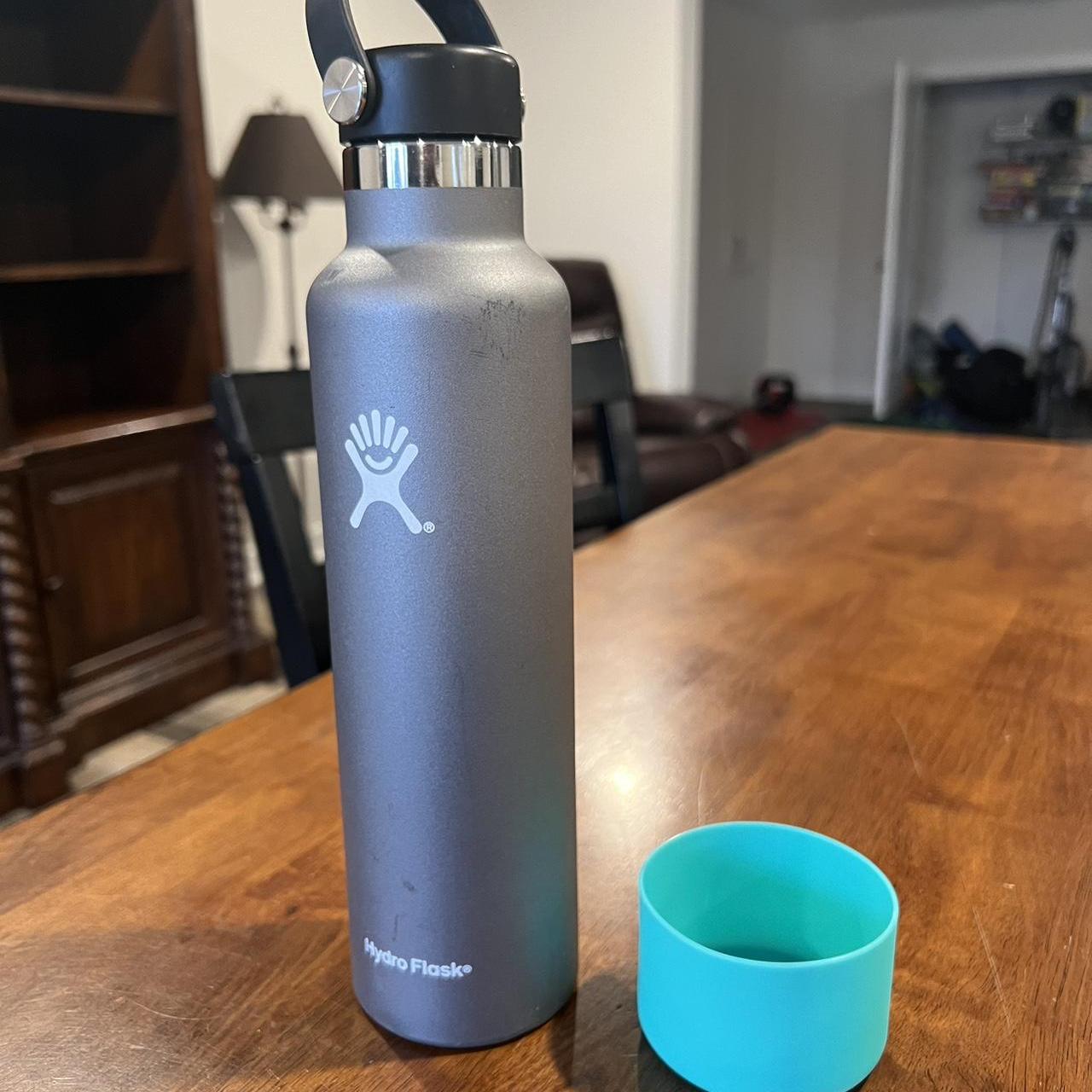 Silver 24 oz hydroflask with blue bottom... - Depop