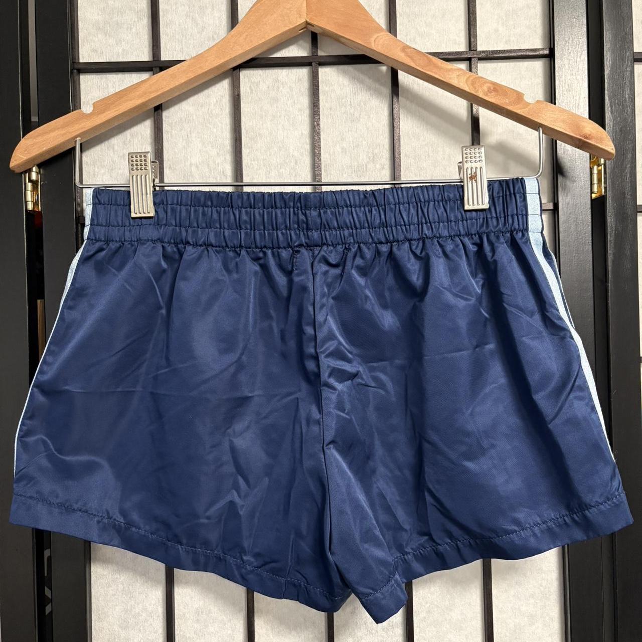 navy and baby blue track shorts. brand is edikted | Depop