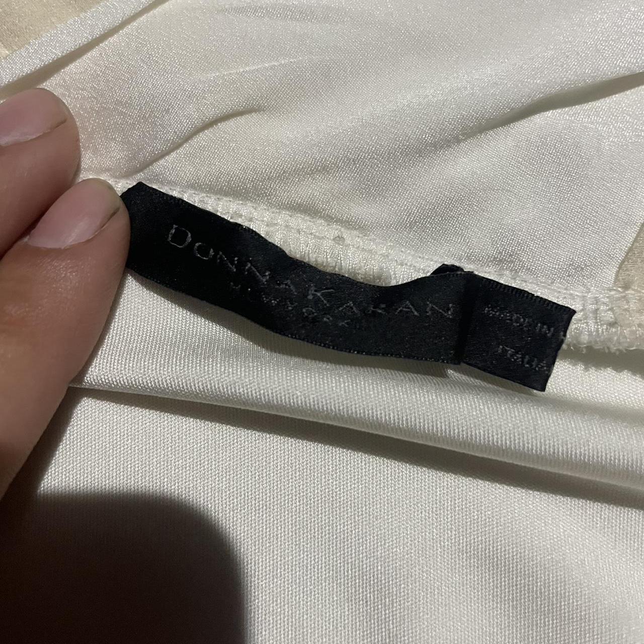 Cream Donna Karan top with a touch of elegance... | Depop