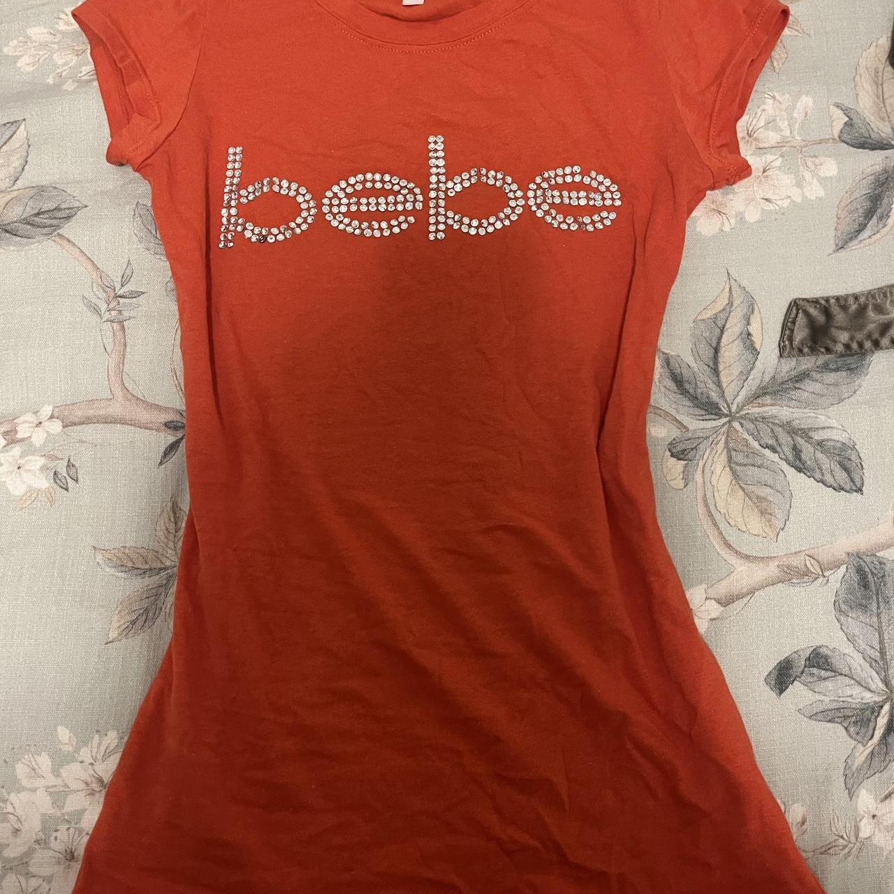 Orange Bebe rhinestone top labelled size M but fits... | Depop
