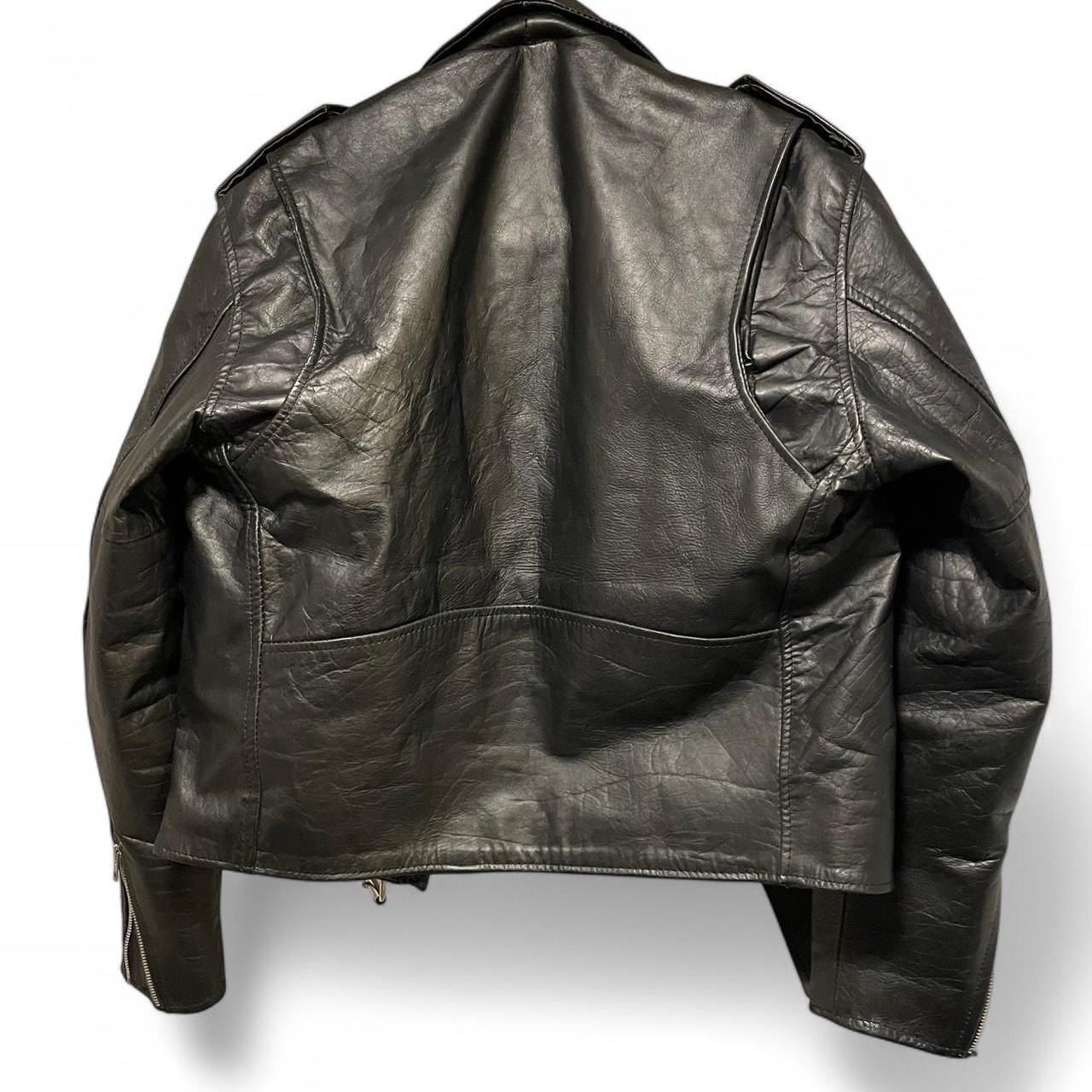 Black leather Xelement motorcycle jacket with... | Depop