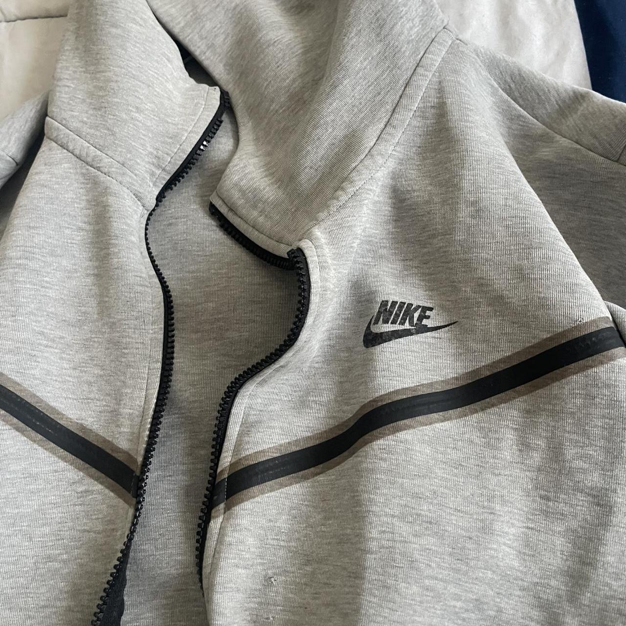 Nike tech hoodie needs a zipper the one I had got... | Depop