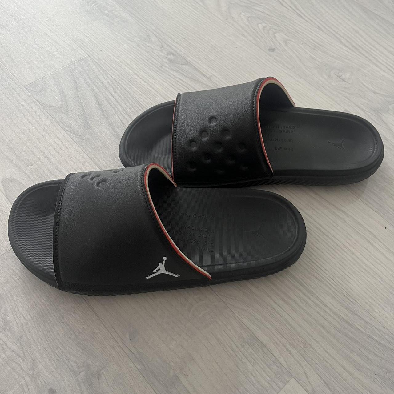 | Black Nike Jordan sliders, still in brand new... - Depop