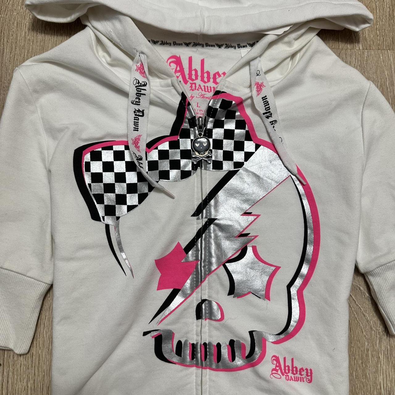 RARE abbey dawn zip up with skull & checkered... | Depop