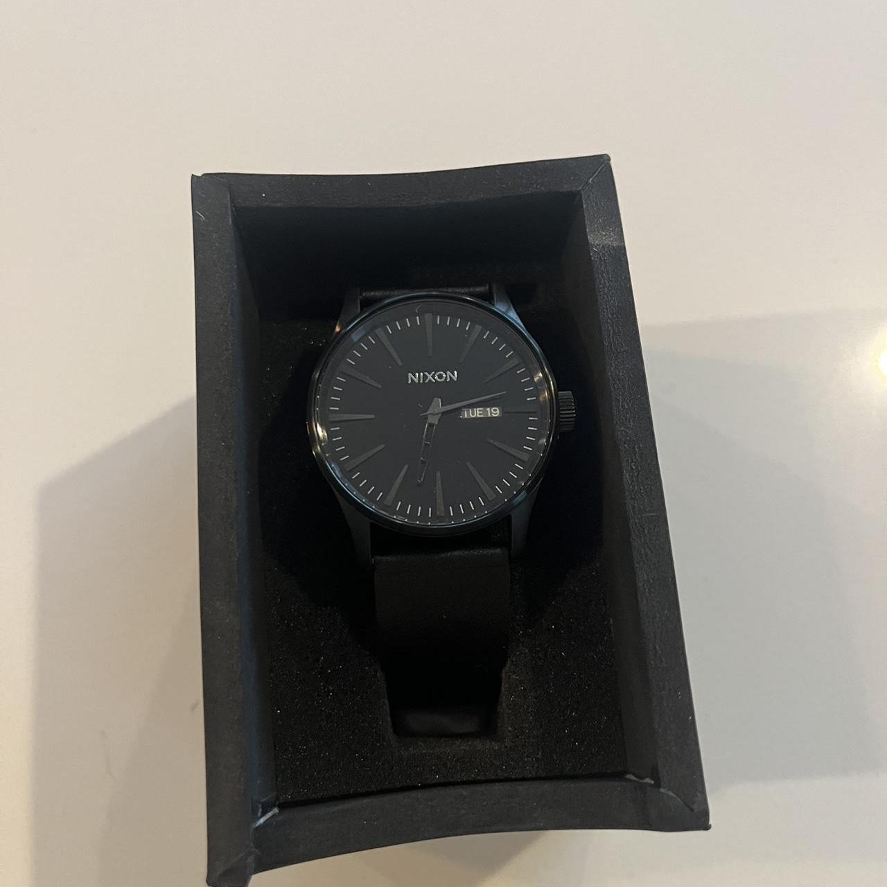 Sleek black Nixon Sentry Leather watch #accessorize... | Depop