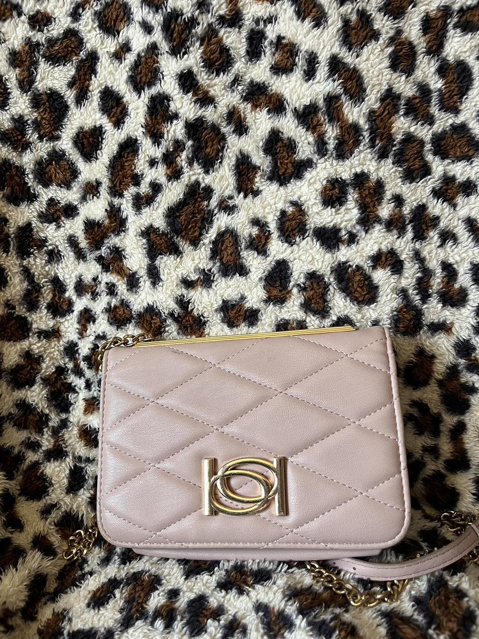 pink bebe purse with gold hardware, has a few marks... - Depop