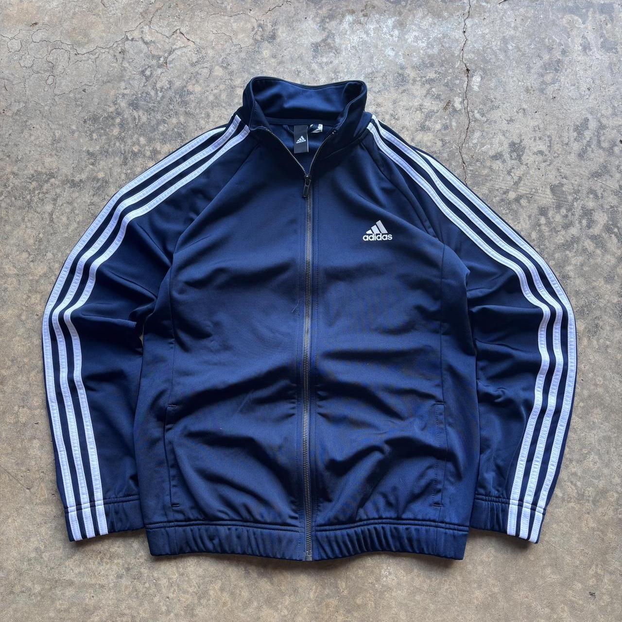 Navy blue Adidas track jacket with white... | Depop