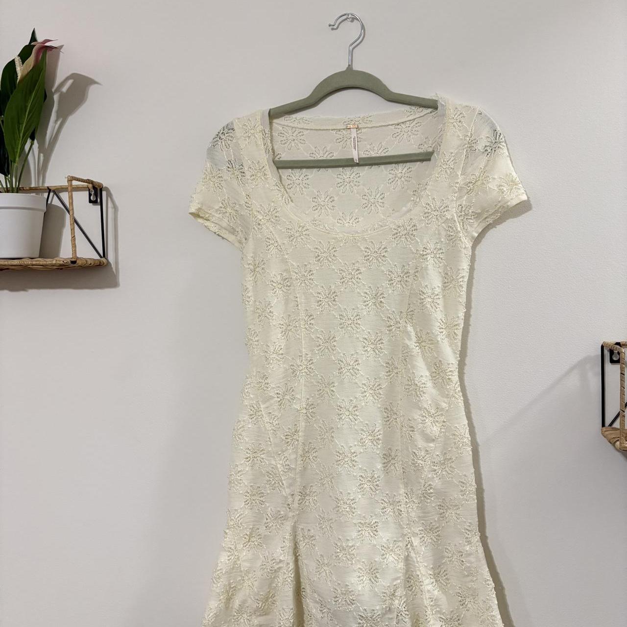 Free People cream lace mini dress with floral... | Depop