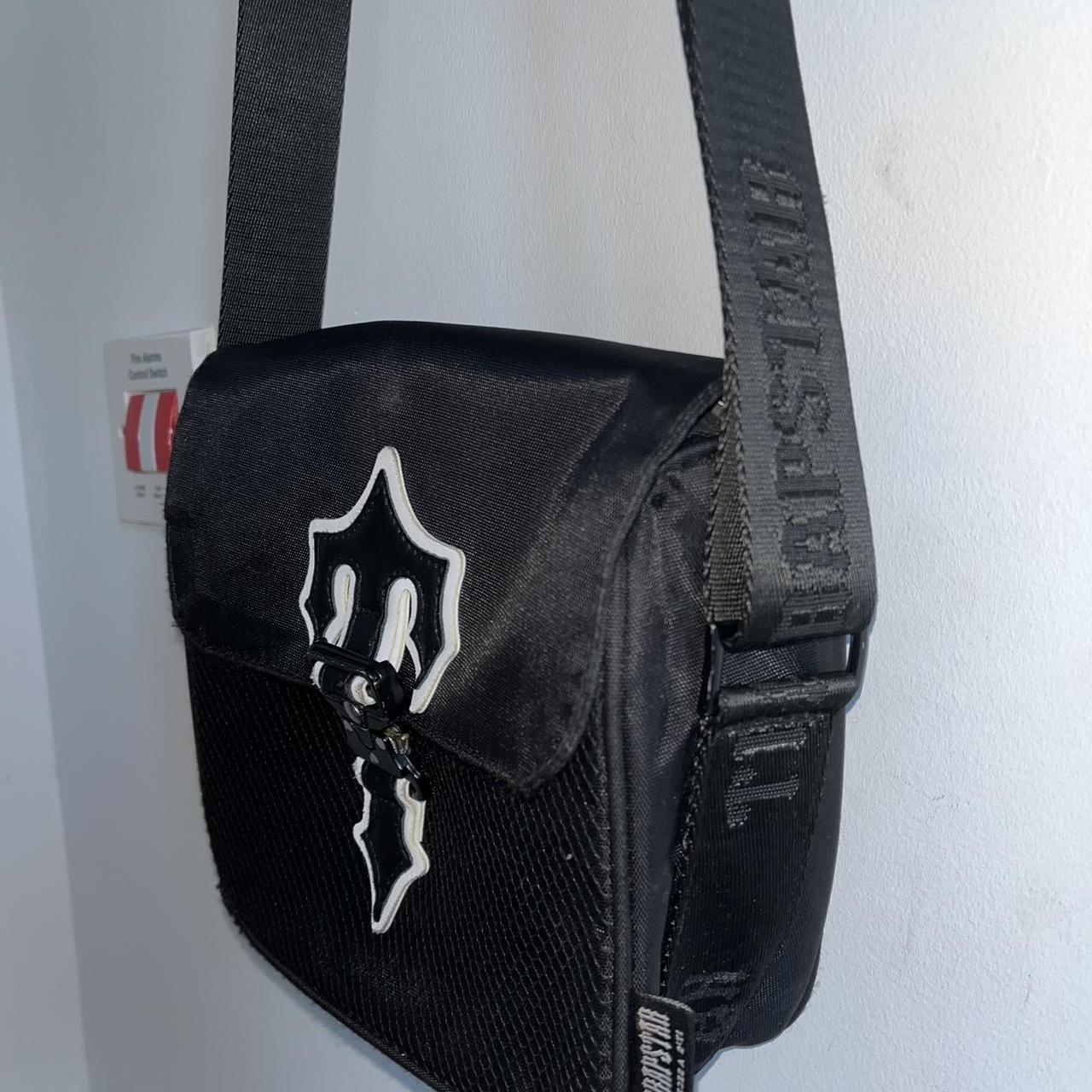 Black Trapstar cross body bag with adjustable straps... | Depop