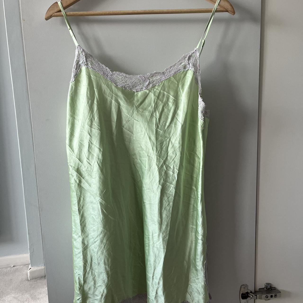 Super cute green with Lacey detailing mini slip... | Depop