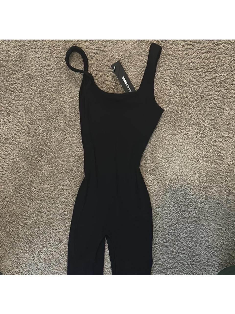 Black fashionnova jumpsuit, never worn too small for me - Depop