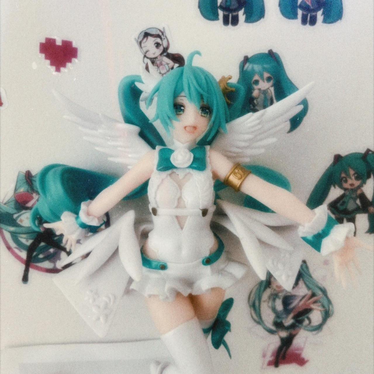 Miku angelic figure 🪽🪽 Back piece falls off... - Depop