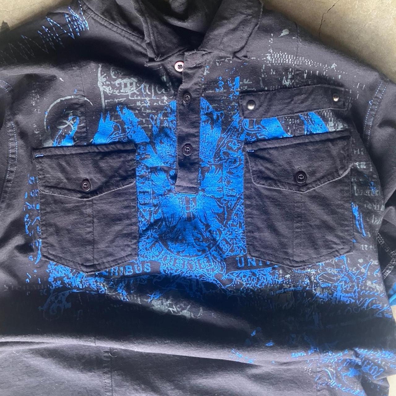 Y2K demon blue and black button polo shirt Size 📐... | Depop