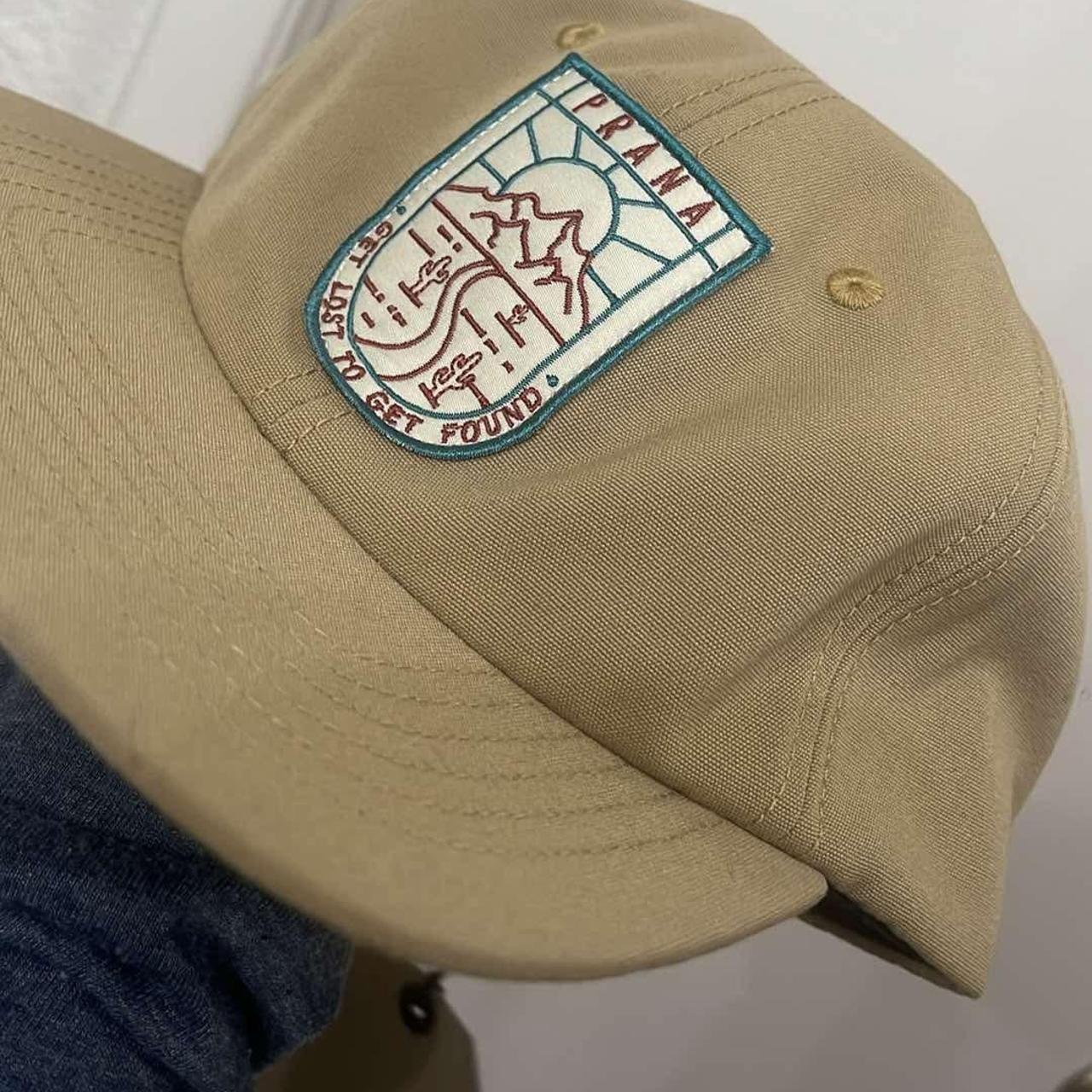 Brand new with tags PrAna tan cap with... | Depop