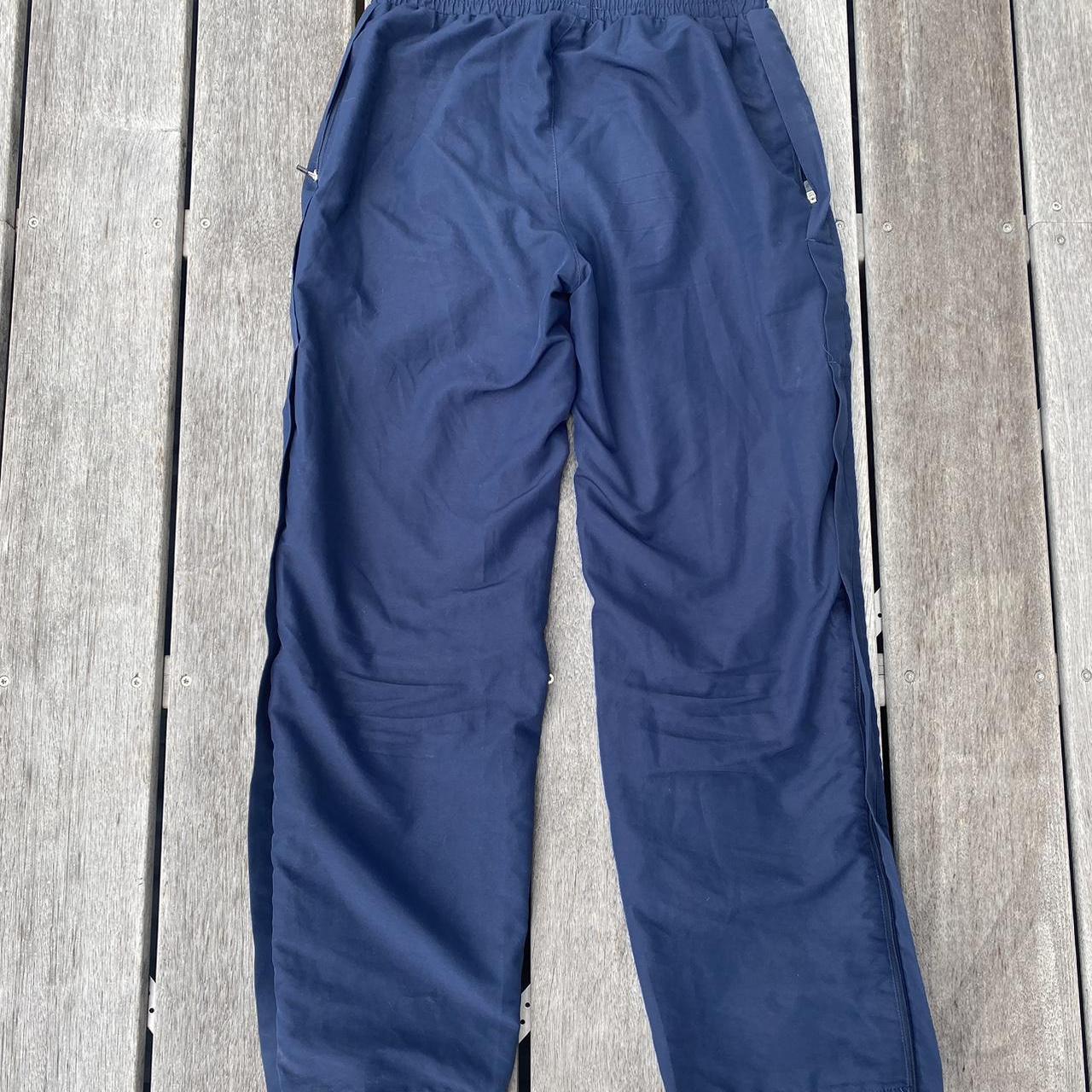 ASICs track pants With zipper on the legs Pant... | Depop