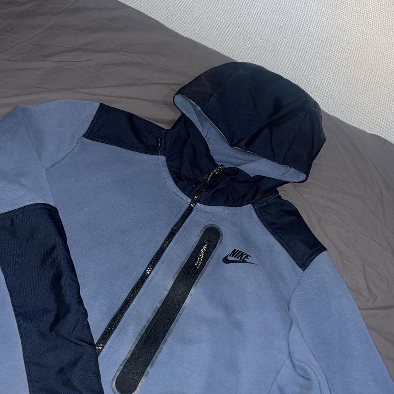 Blue nike woven tech fleece zero damages,hardly worn... | Depop
