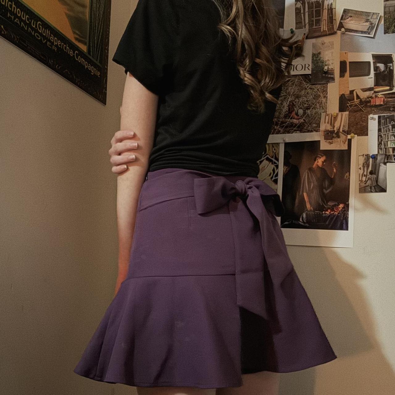 Purple Zara skirt with built in shorts and a bow in... - Depop