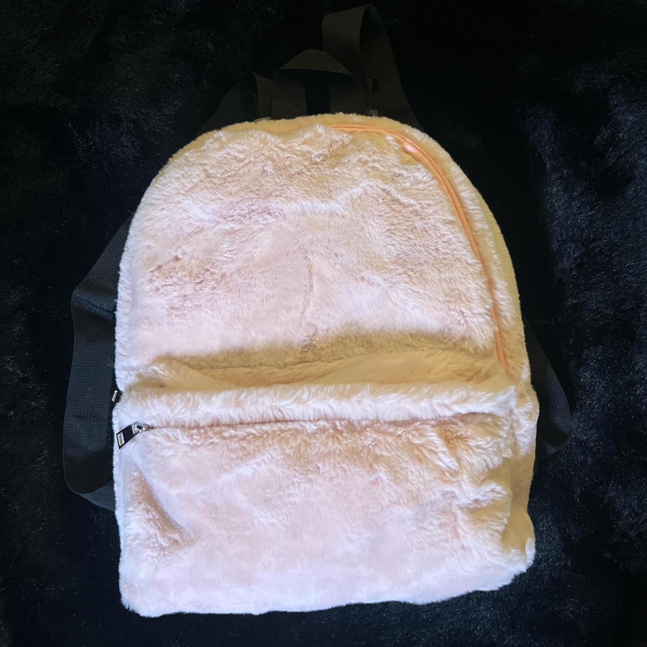 light pink fuzzy backpack with adjustable straps. so... | Depop