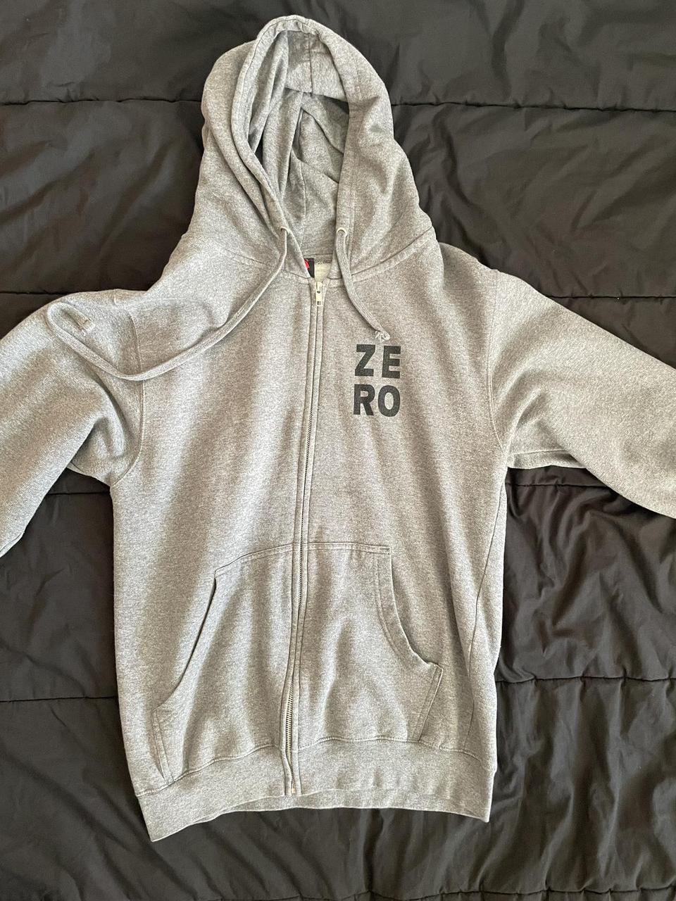 Grey zero zip up hole on left sleeve - Depop