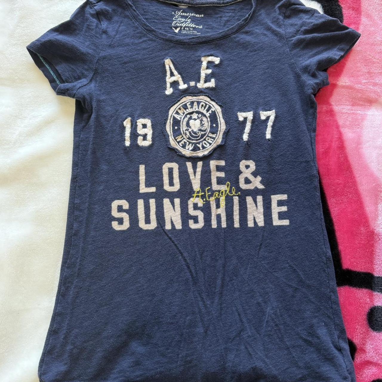 Navy American Eagle baby tee Small hole near the tag... | Depop