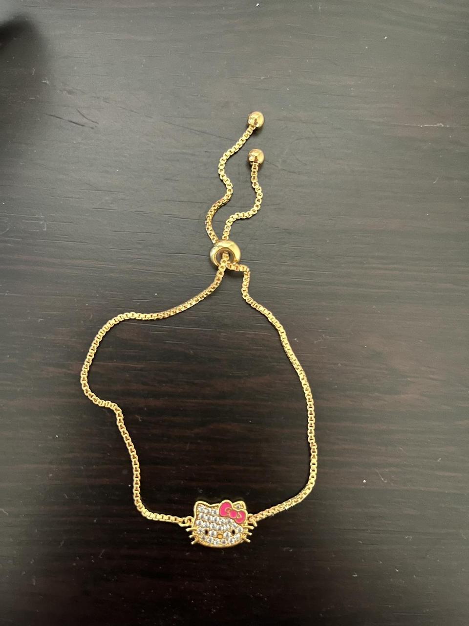 Hello kitty gold plated adjustable... - Depop
