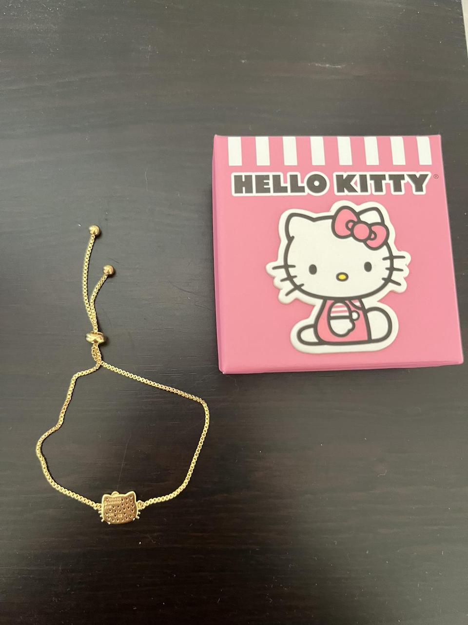 Hello kitty gold plated adjustable... - Depop