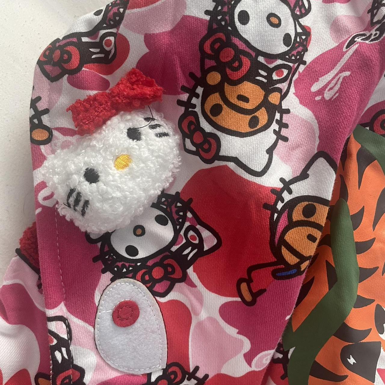 Pink and white BAPE x Hello Kitty hoodie Brand... | Depop