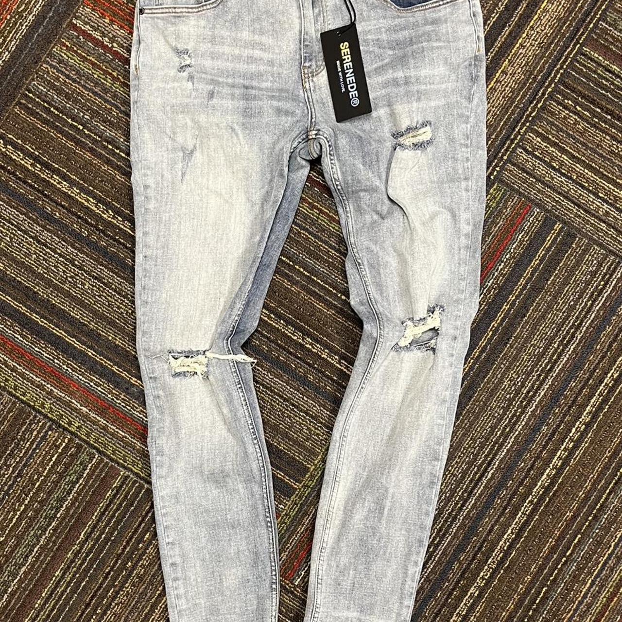 Distressed light wash denim skinny jeans with ripped... | Depop