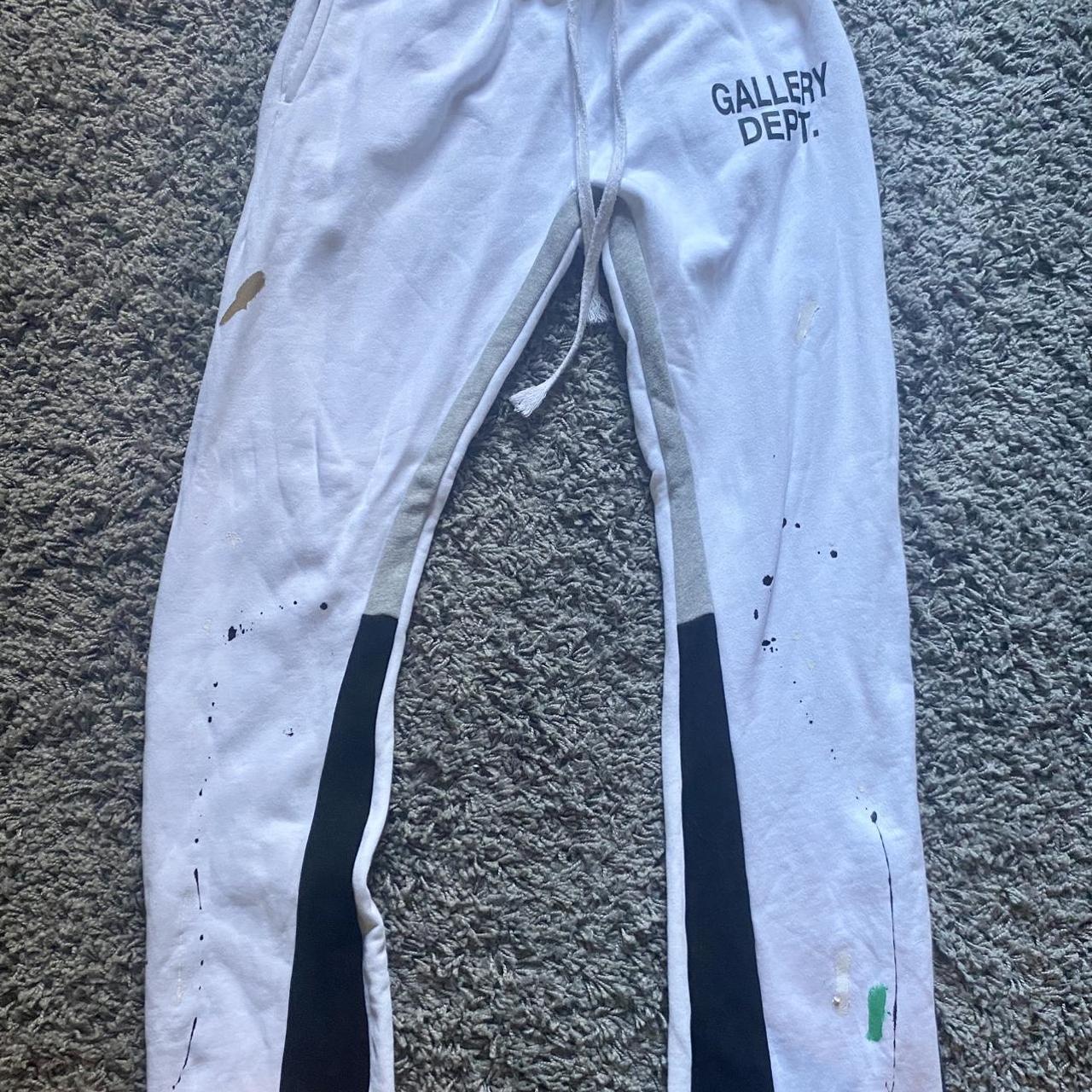 Gallery Dept. paint splatter flair pants- white and... | Depop