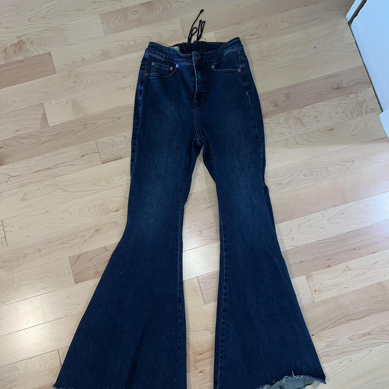 Super wide bell bottom jeans, lace up back, very... - Depop