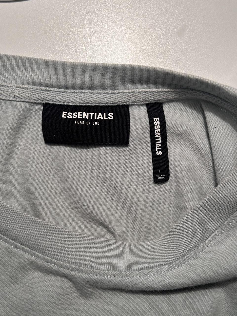 fear of god essentials light blue t-shirt size L |... - Depop