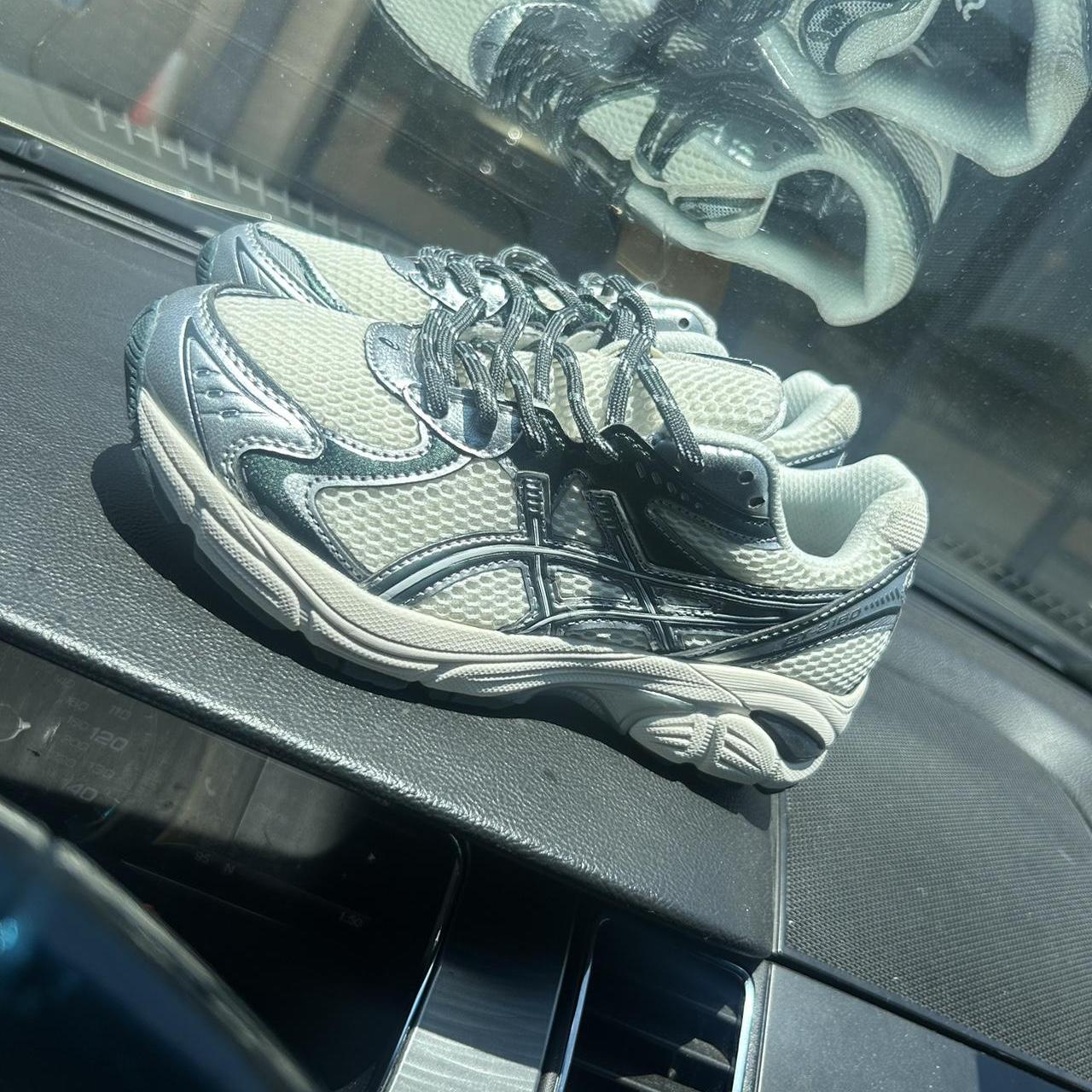 Sliver and dark green ASIC - Depop